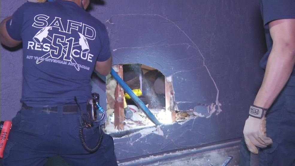 Woman jumps out of bed after SUV crashes into apartment building | WOAI