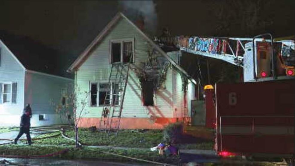 Rochester firefighter falls from window while battling house fire | WHAM
